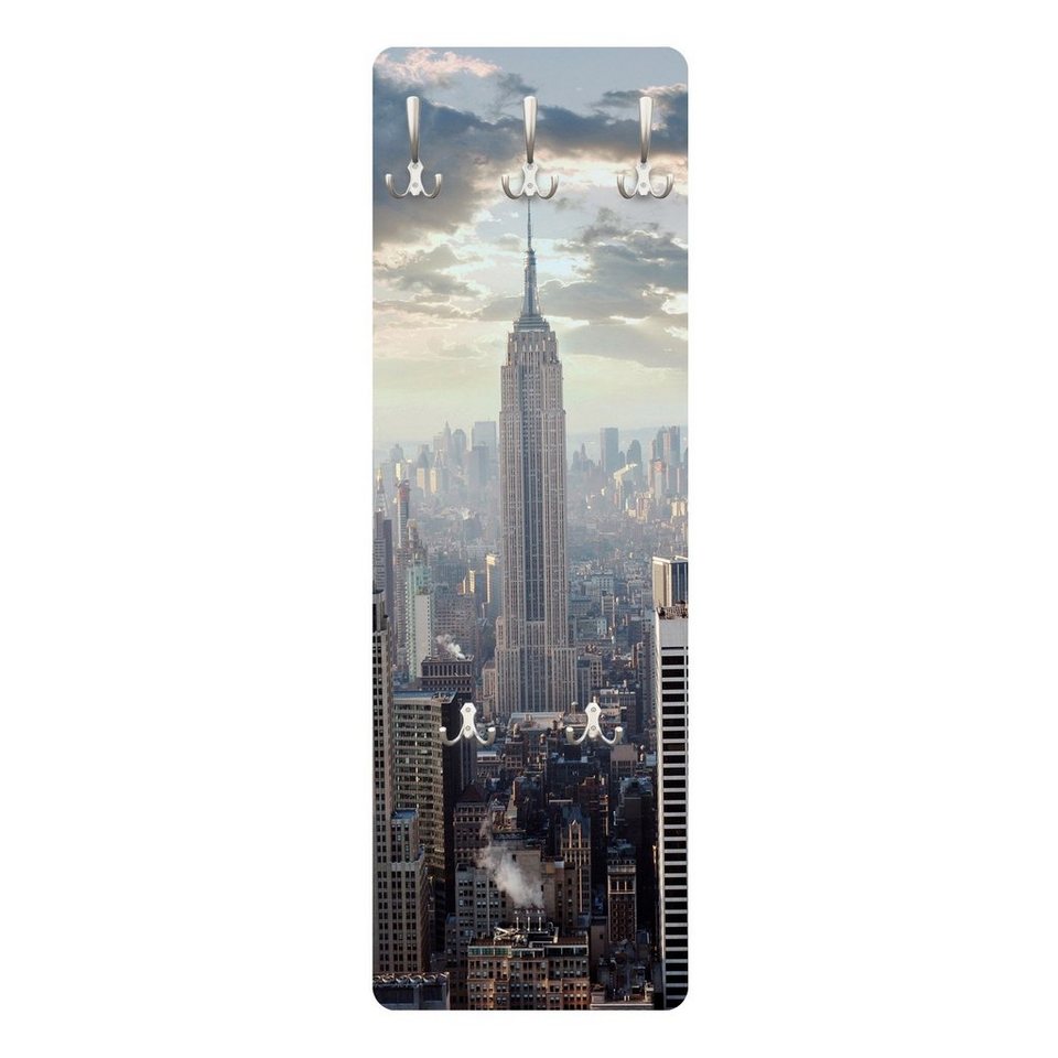 Bilderdepot24 Garderobenpaneel Beige Städte Skyline Sonnenaufgang In