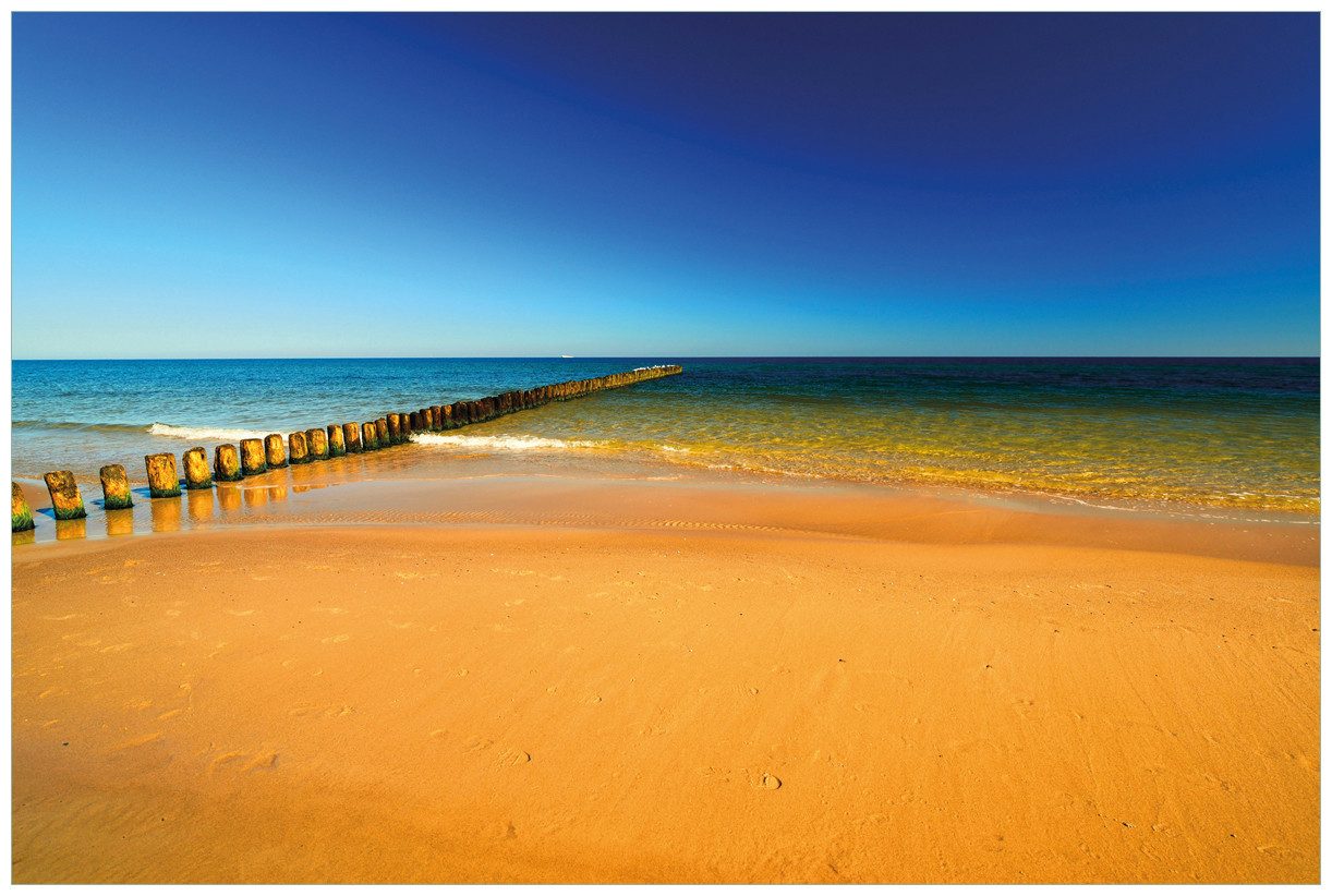 Wallario Wandfolie Sandstrand In Orange Blaues Meer Blauer Himmel