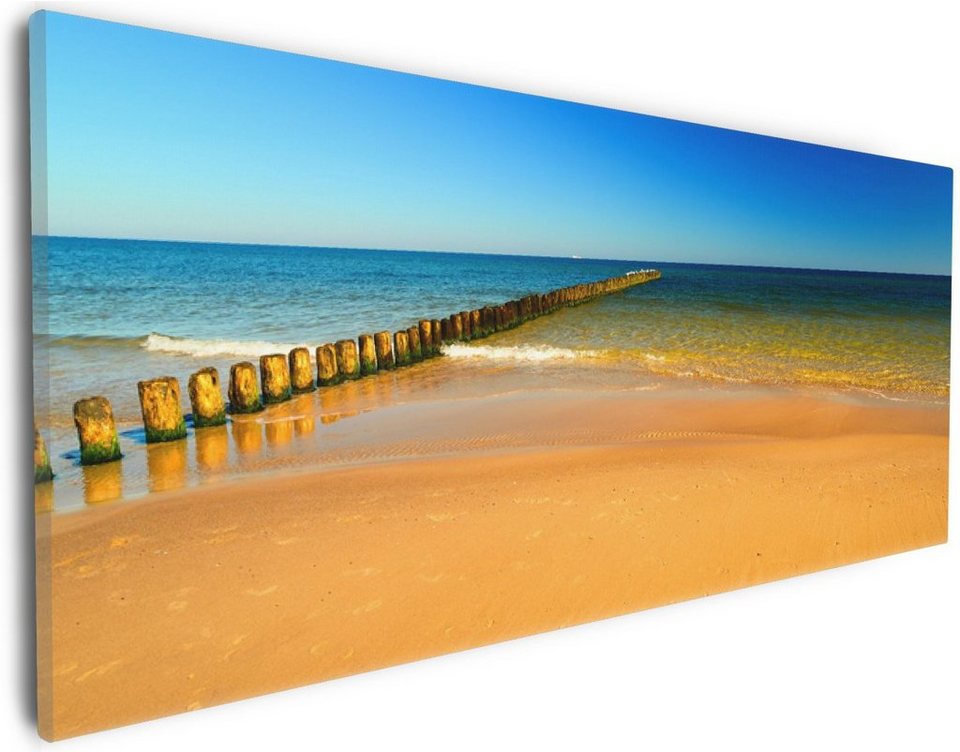Wallario Leinwandbild Sandstrand In Orange Blaues Meer Blauer